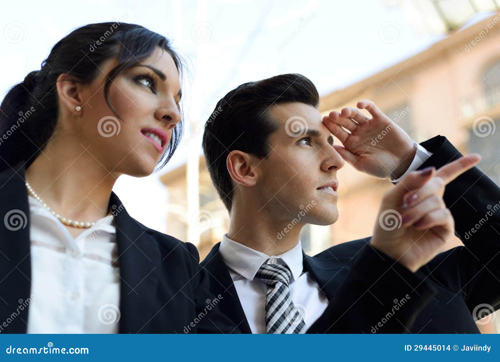 Attractive Business People Looking at Something Interesting. Couple ...