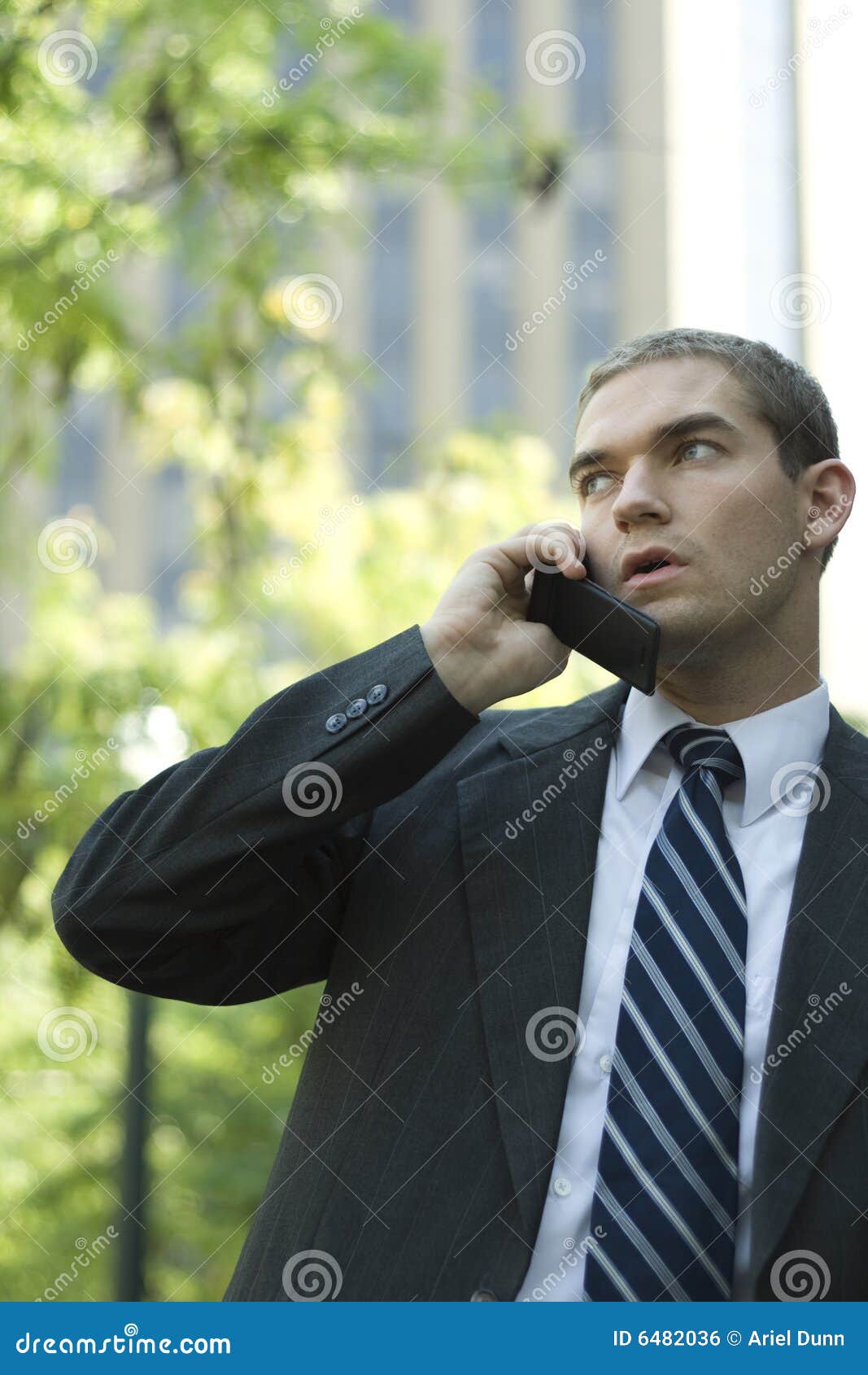 Attractive Businessman Using Cell Phone Outside Stock Photo - Image of ...