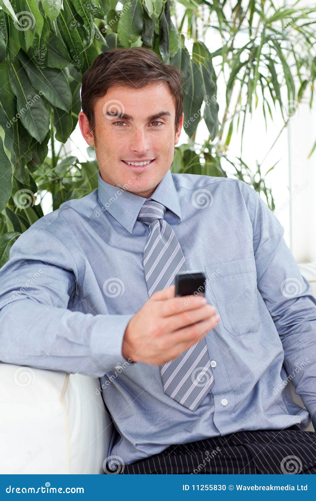 Attractive Businessman Writing a Message Stock Photo - Image of ...