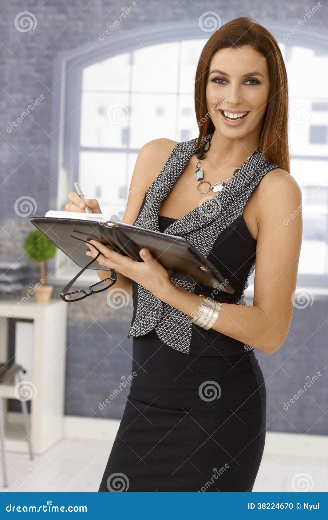 Personal Organizer And Pen On The Desk The Background Of Graphs Stock ...