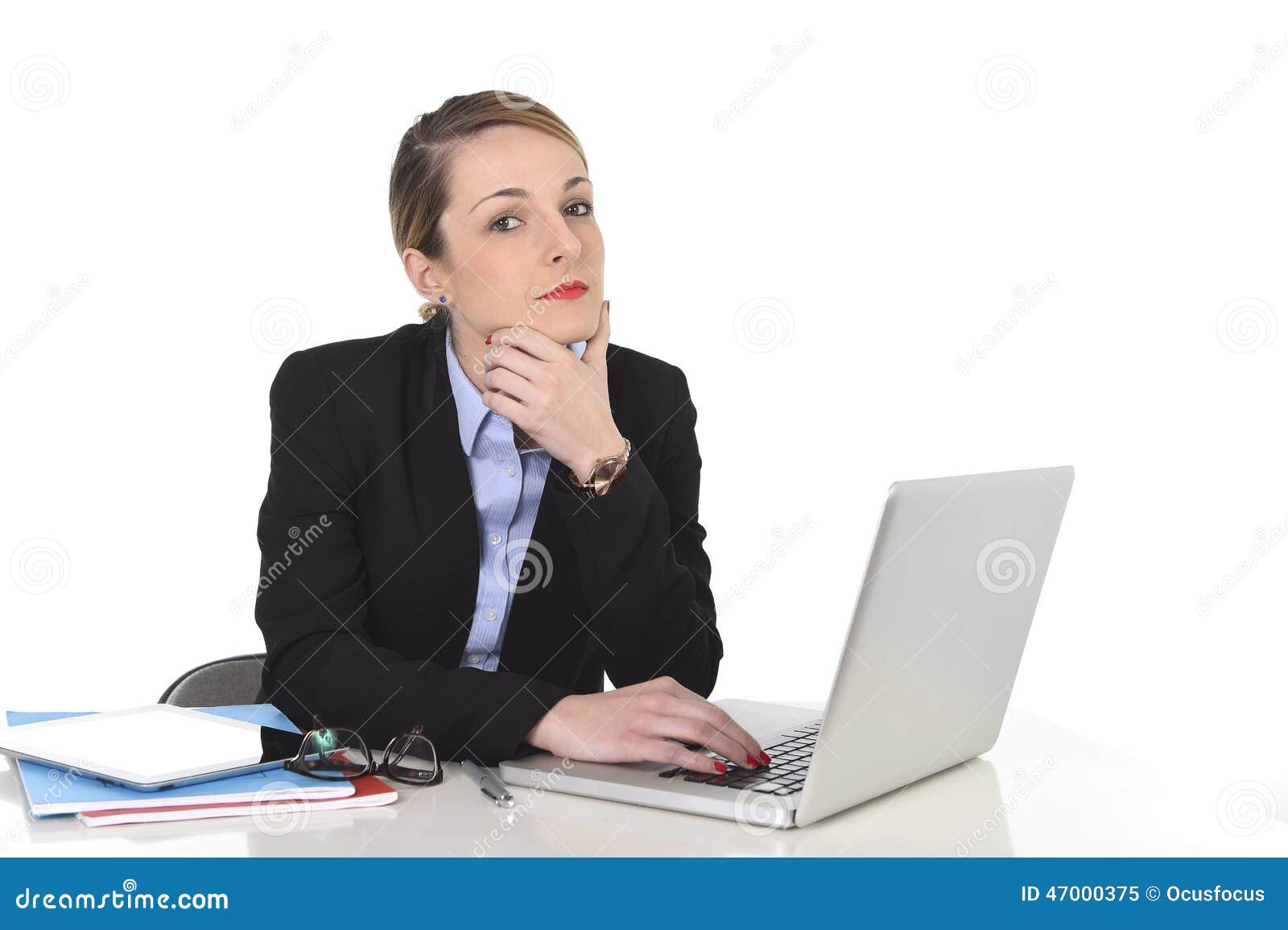 Attractive Businesswoman Thinking and Looking Distraught while Working ...