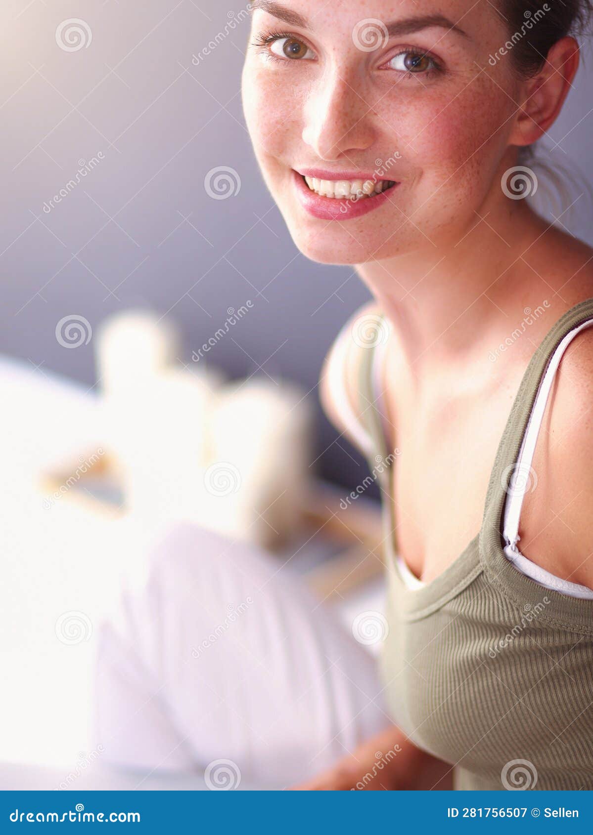 Attractive Caucasian Girl Sitting On Floor With Cup And Tablet Near