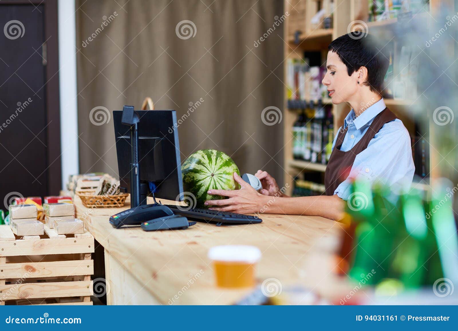 Attractive Checkout Operator at Work Stock Image - Image of cashier ...