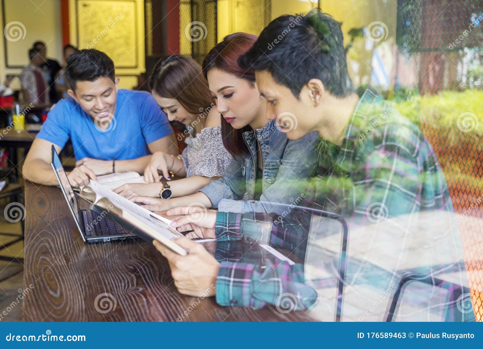 Attractive College Students Studying in Cafe Stock Image - Image of ...