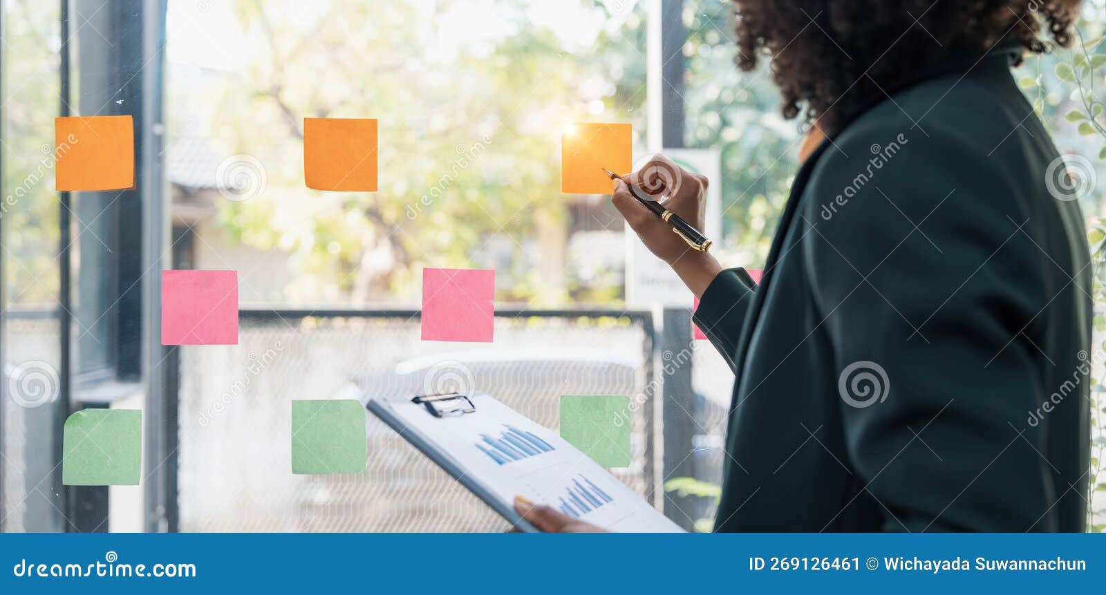 Attractive Concentrated Business Lady in Creating To-do List Using ...