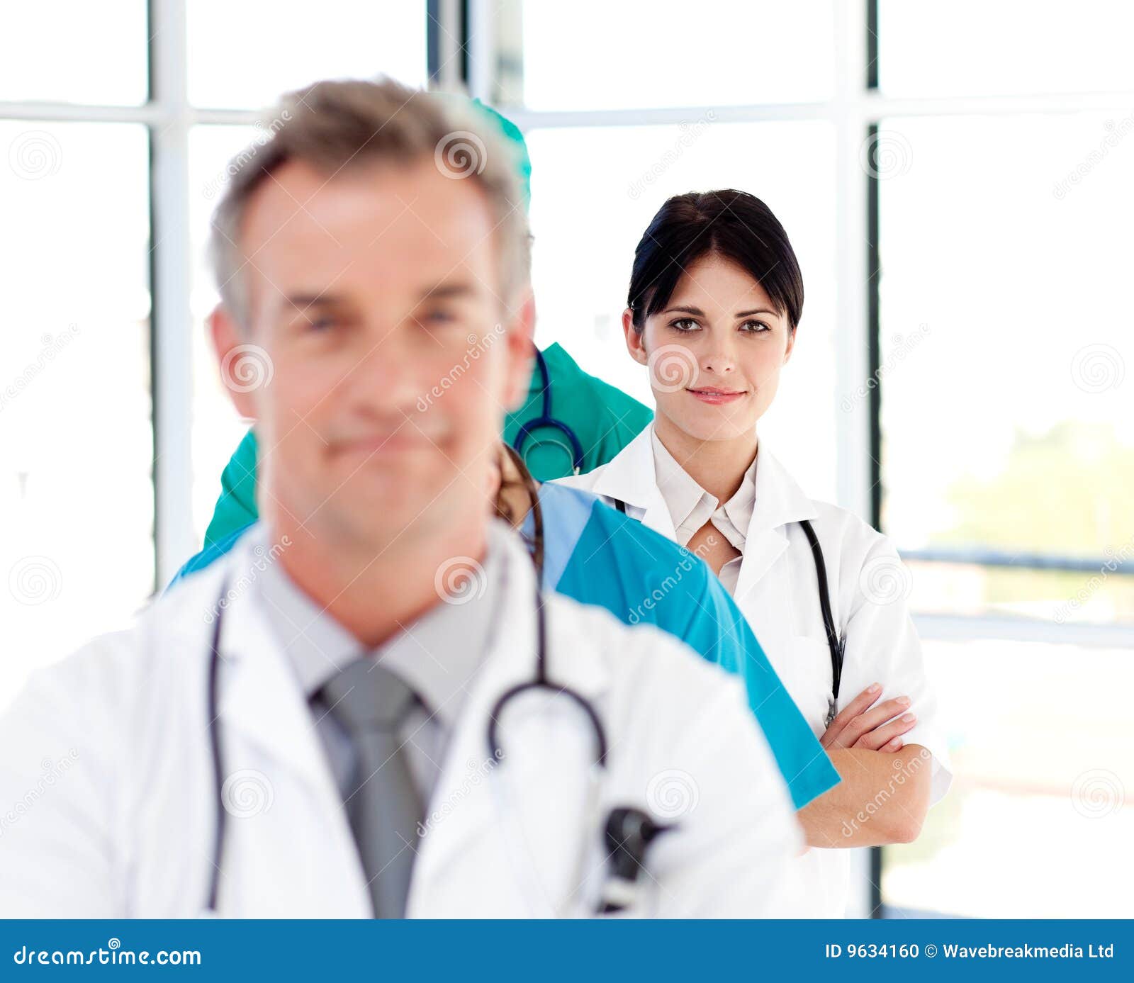 Attractive Confident Doctor in a Line Stock Photo - Image of adult ...