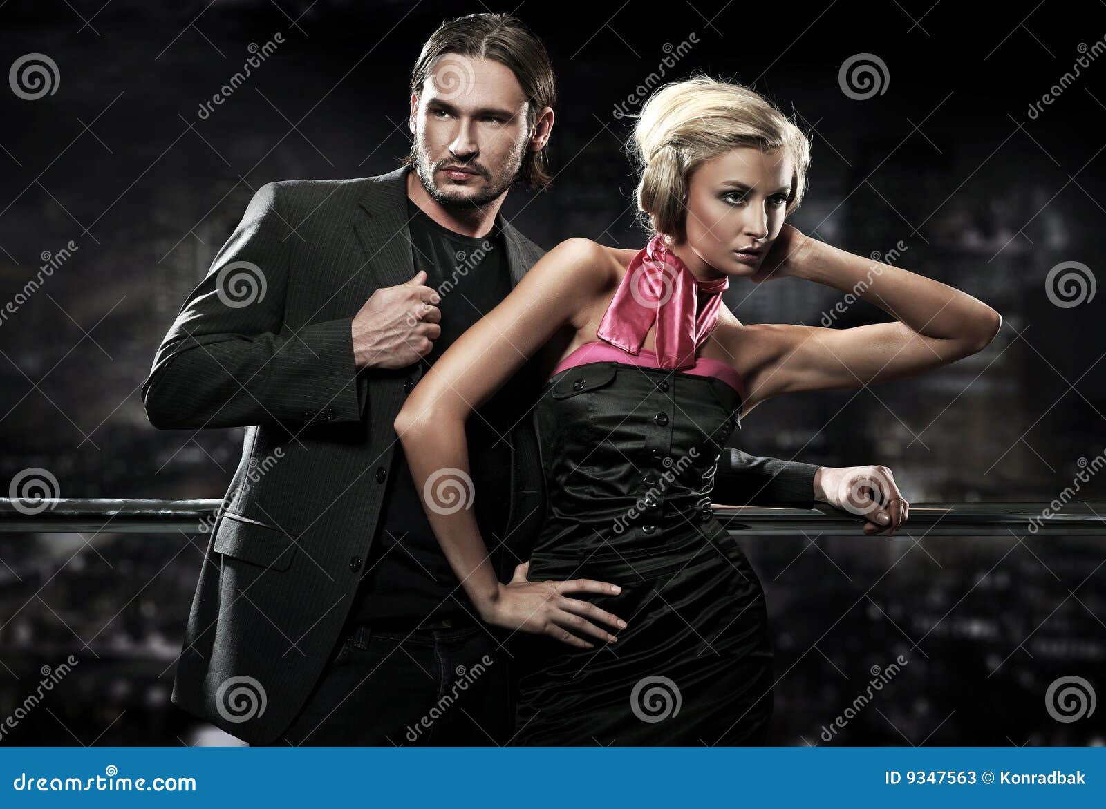 Attractive Couple Of A Girl And Shirtless Muscular Male Have Fun With A ...