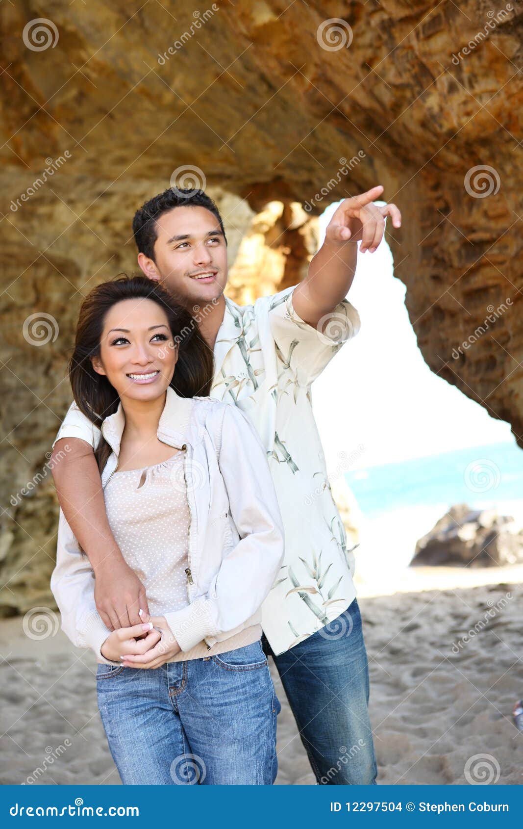 Attractive Couple at Beach stock photo. Image of playful - 12297504