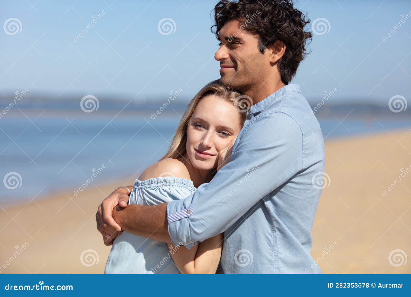 Attractive Couple Cuddling at Beach Stock Photo - Image of cheerful ...
