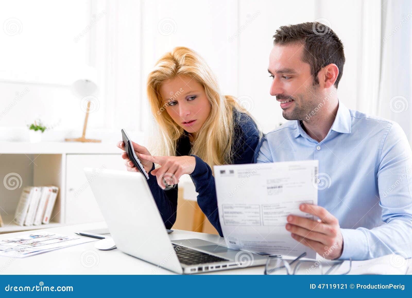 Attractive Couple Doing Administrative Paperwork Stock Image - Image of ...