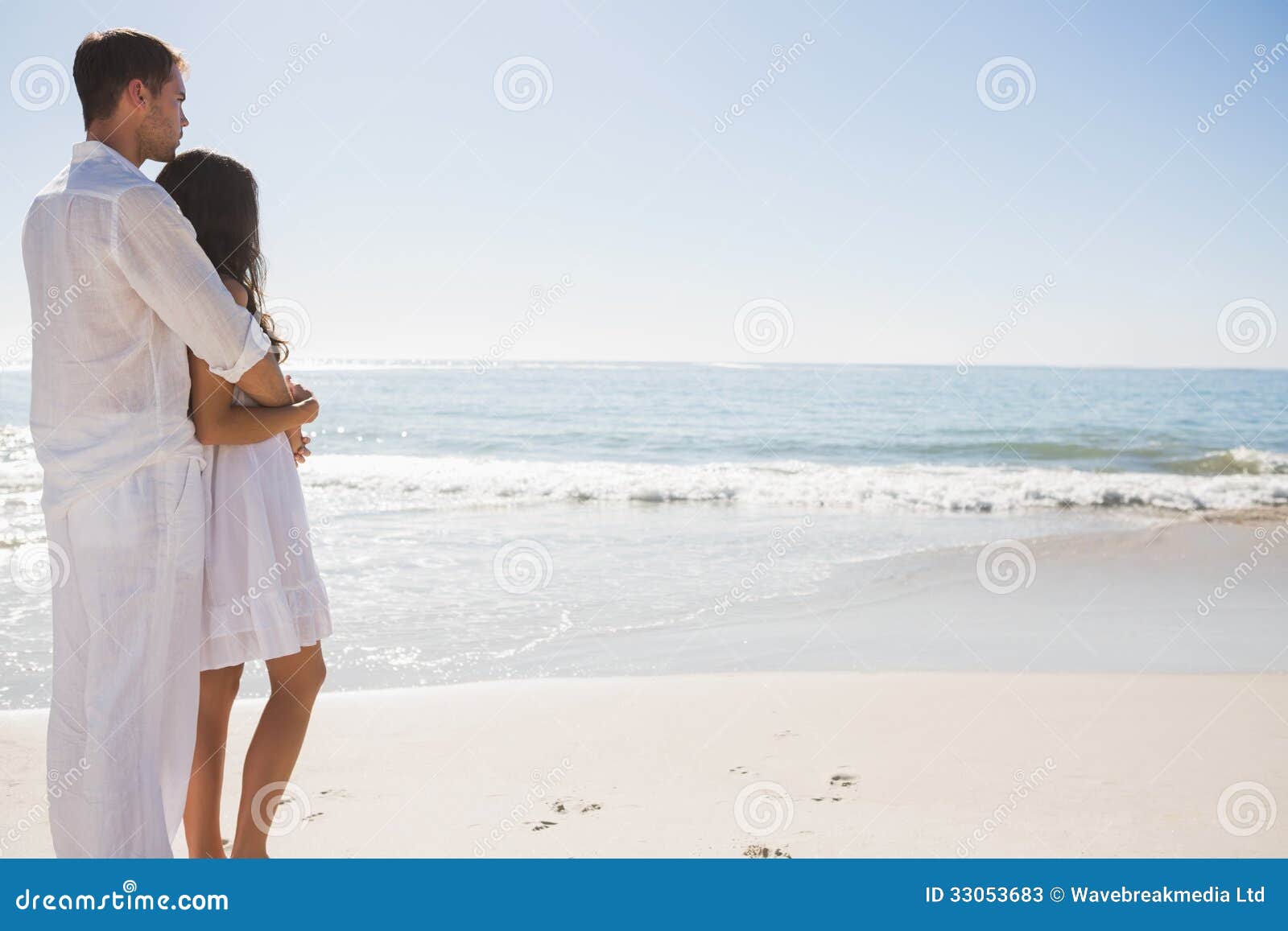 Attractive Couple Looking Out at Sea Stock Image - Image of caucasian ...