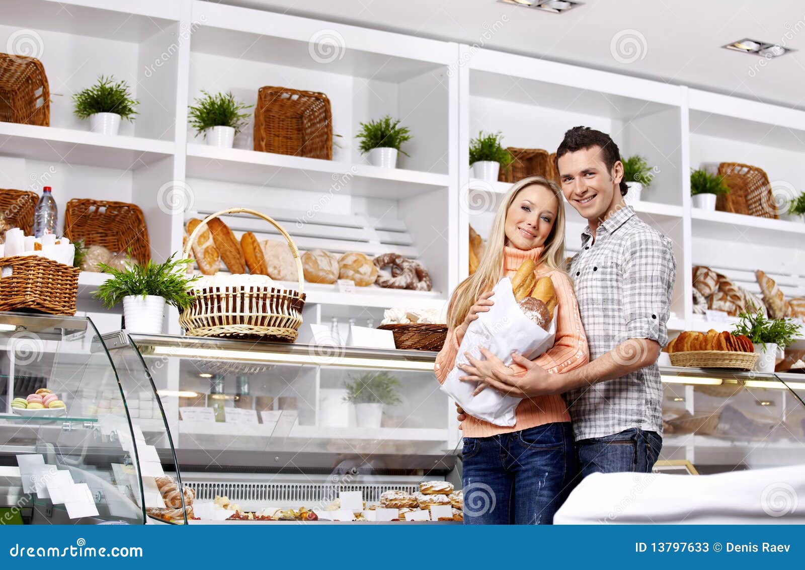 Attractive couple in shop stock image. Image of bread - 13797633