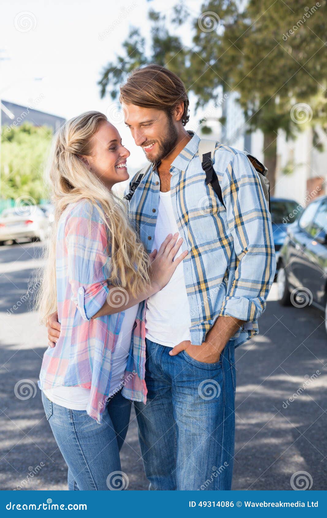 Attractive Couple Standing and Hugging Stock Photo - Image of outdoors ...