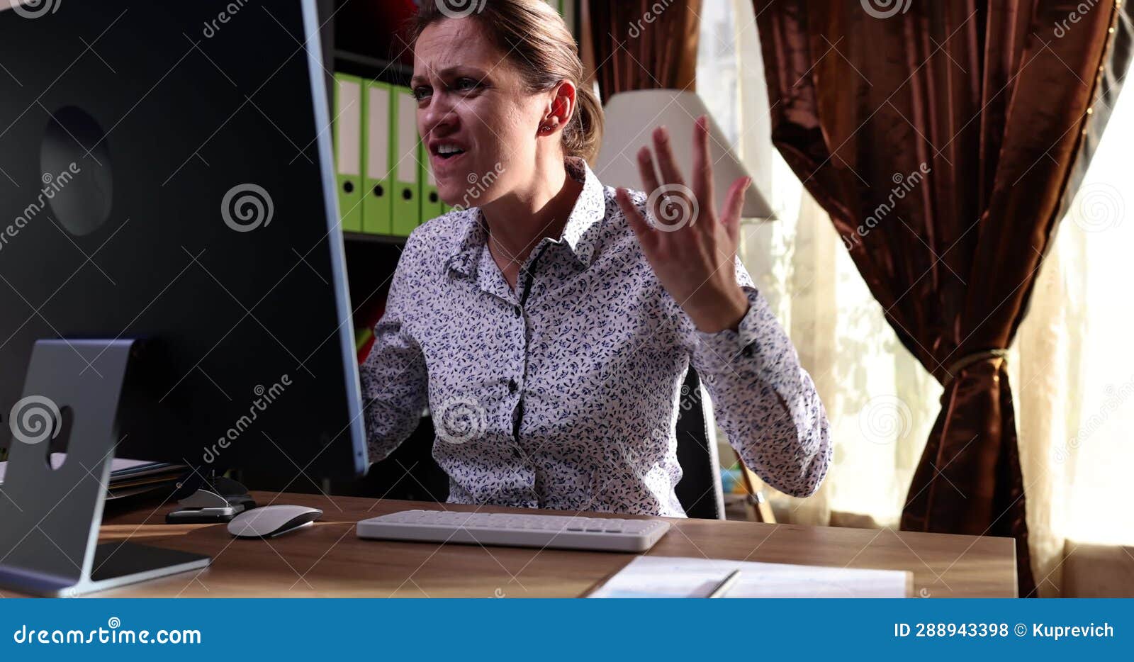Attractive Crazy Business Woman with an Angry Expression Looks at ...
