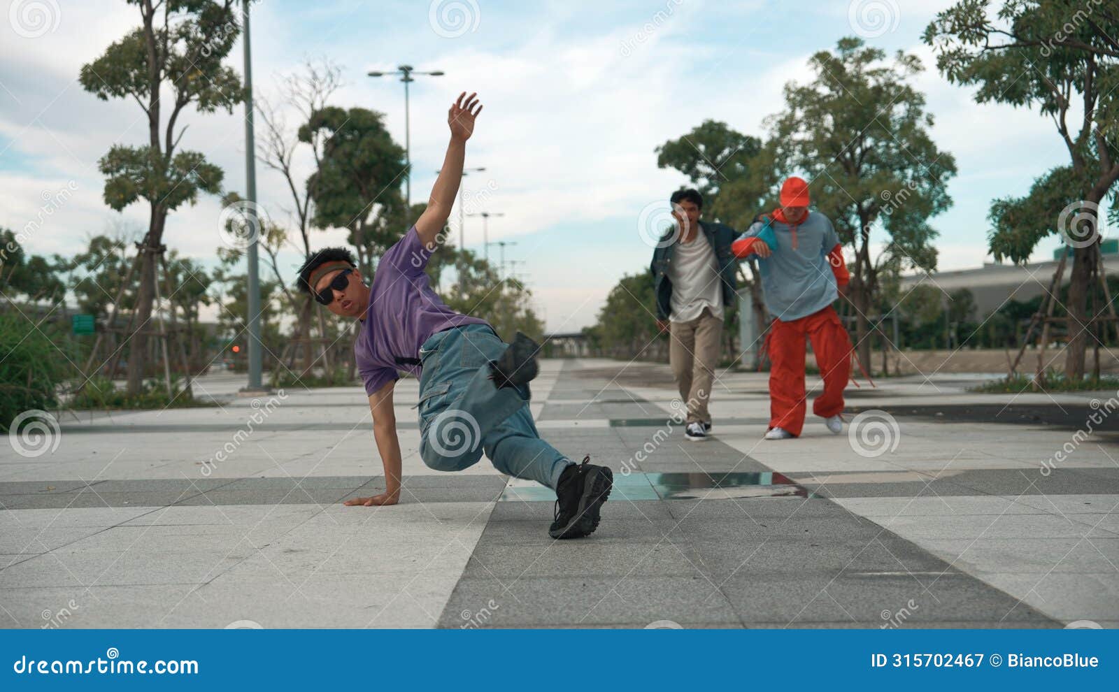 Attractive Dancer Perform Break Dance in Front of Friend Cheering ...