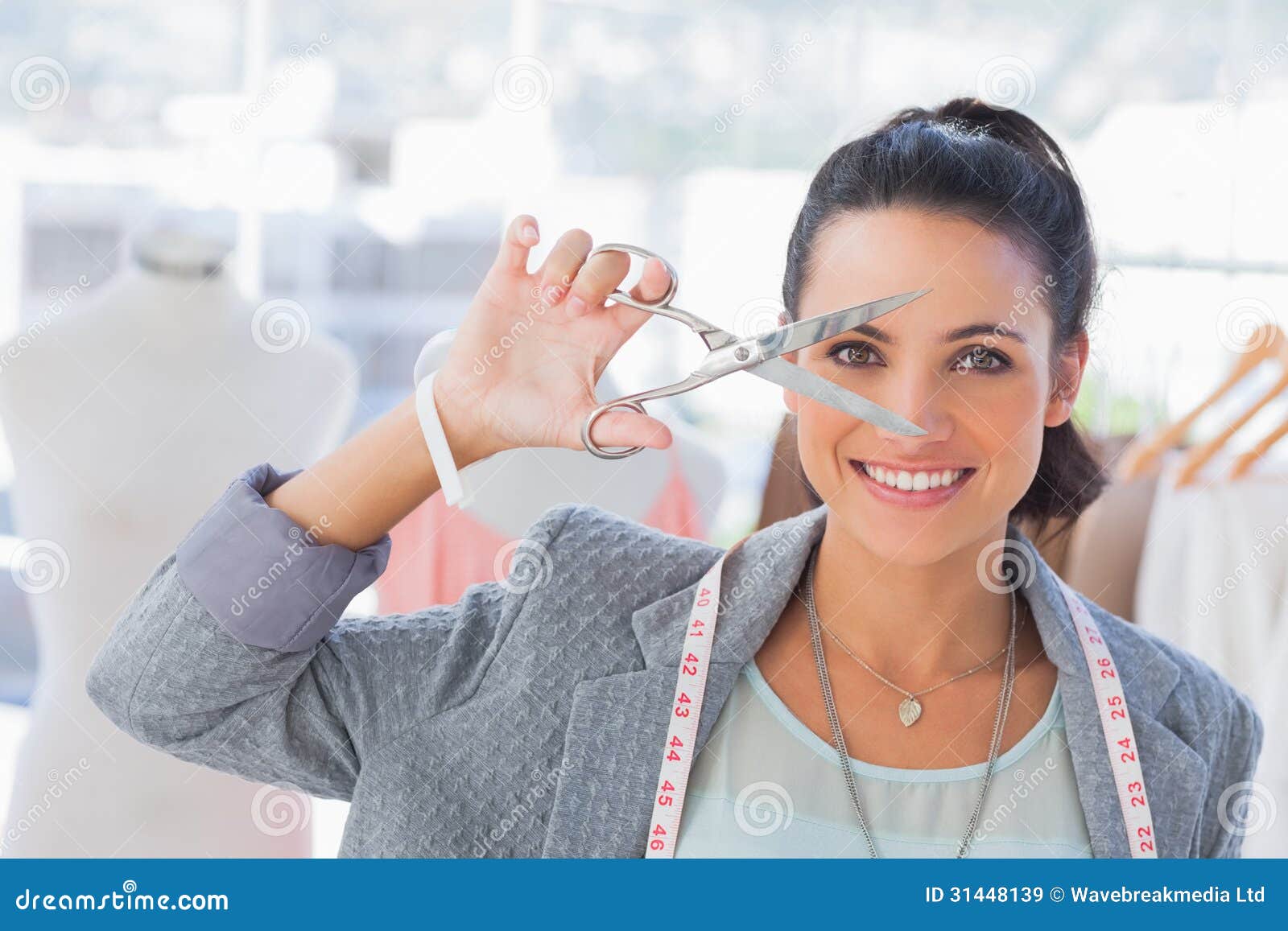 Attractive Designer Holding Scissors in Front of Her Face Stock Image ...