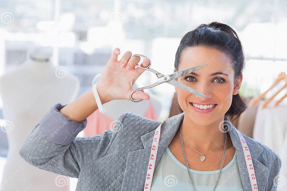 Attractive Designer Holding Scissors in Front of Her Face Stock Image ...