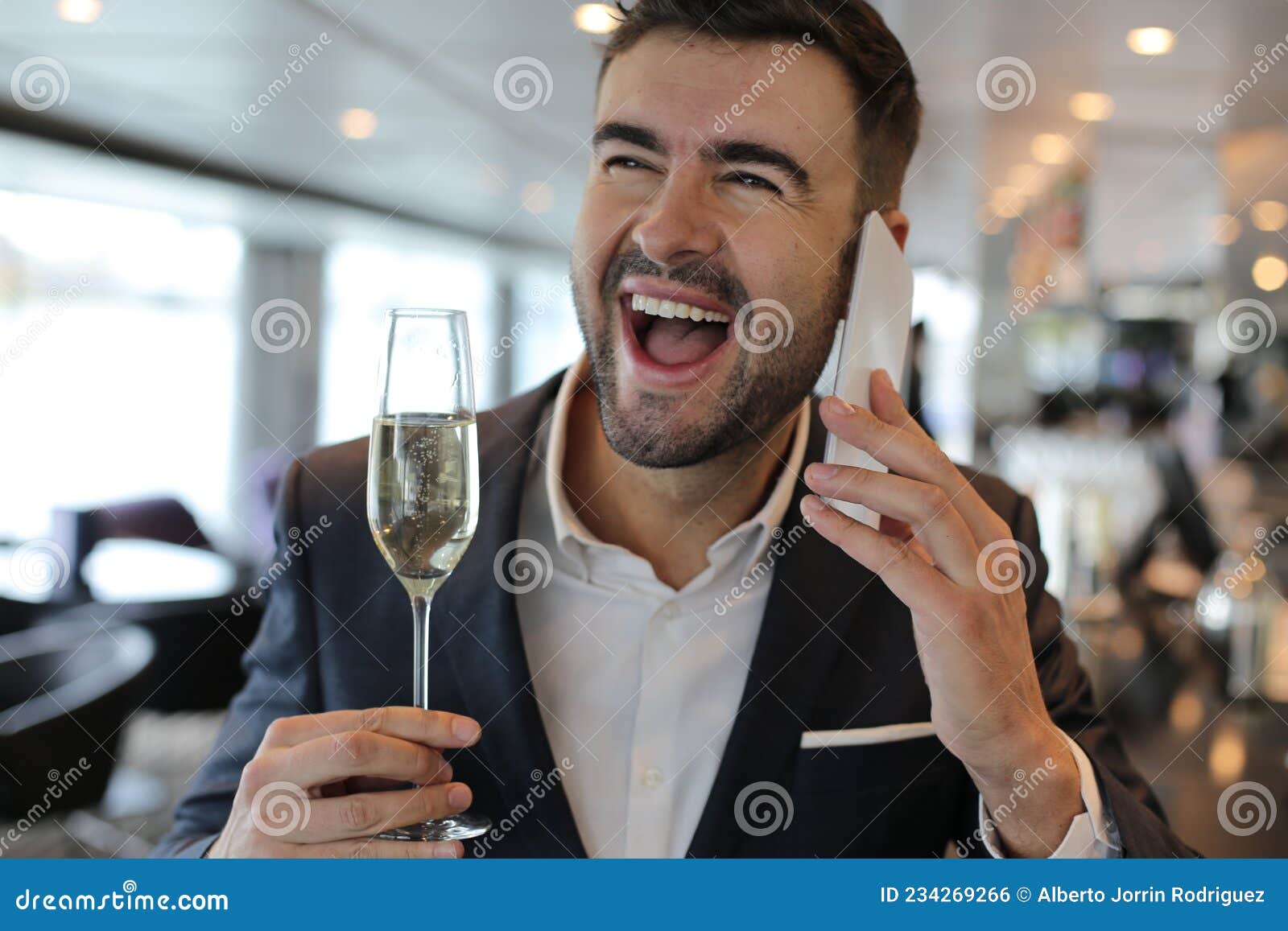 Attractive Elegant Man Making a Call from Luxurious Bar Stock Photo ... Attractive Elegant Man Making a Call from Luxurious Bar Stock Photo ...
