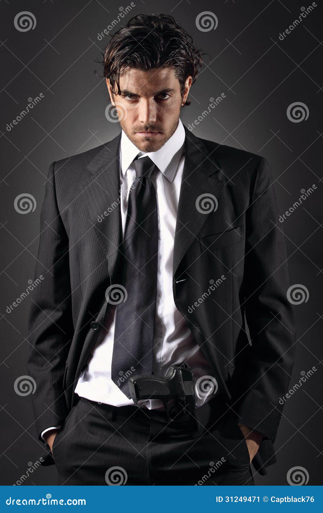 Attractive and Elegant Man Posing with a Gun in His Trousers Stock ...