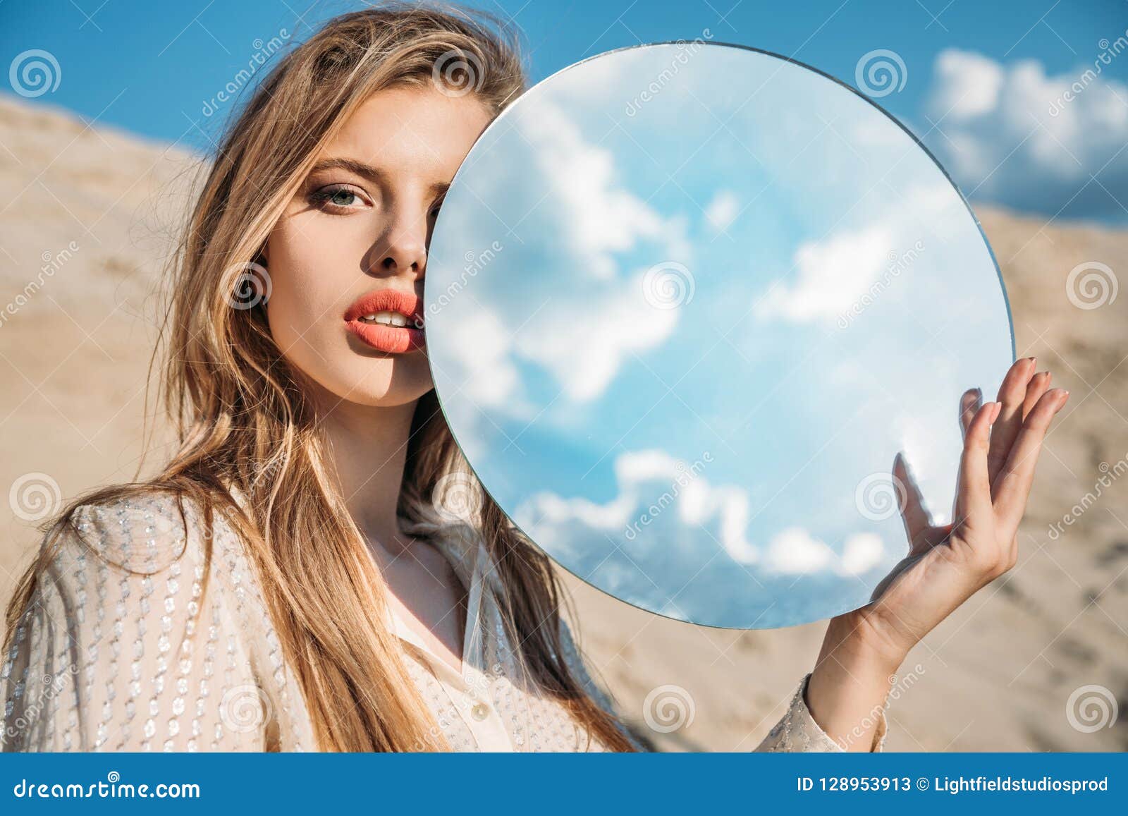Attractive Elegant Model Holding Round Mirror with Reflection of Stock ...