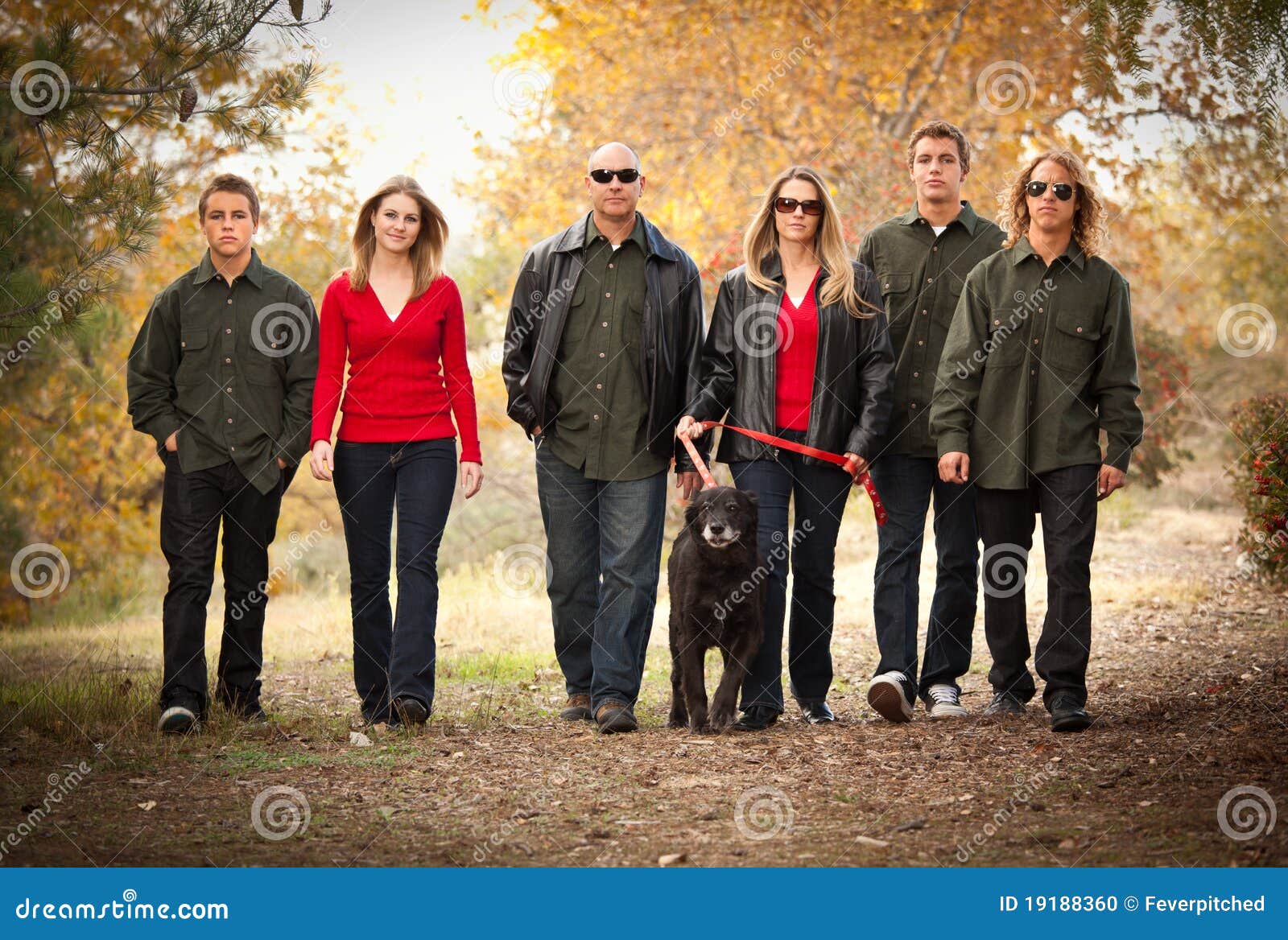 Attractive Family Portrait Walking Outdoors Stock Photo - Image of ...