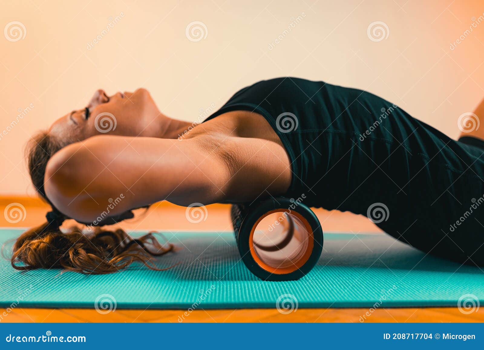 Foam Roller Back Stretching Stock Photo - Image of attractive, female ...