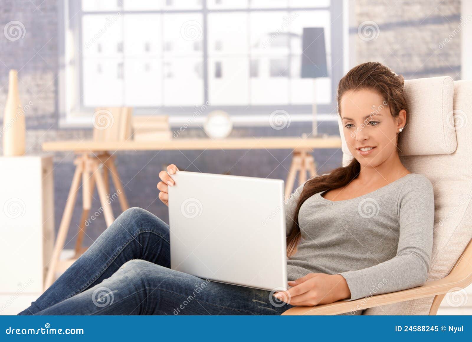 Attractive Female Browsing Internet at Home Stock Image - Image of face ...