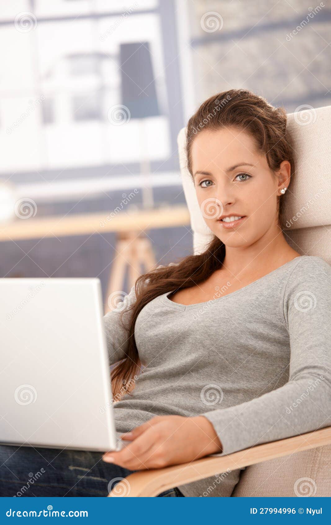 Attractive Female Browsing Internet at Home Stock Photo - Image of ...