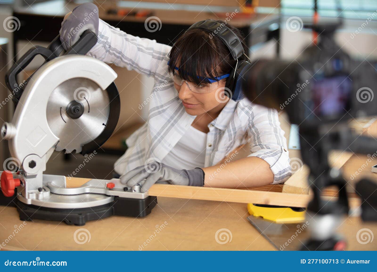 Attractive Female Carpenter Using Power Tools for Work Stock Image ...
