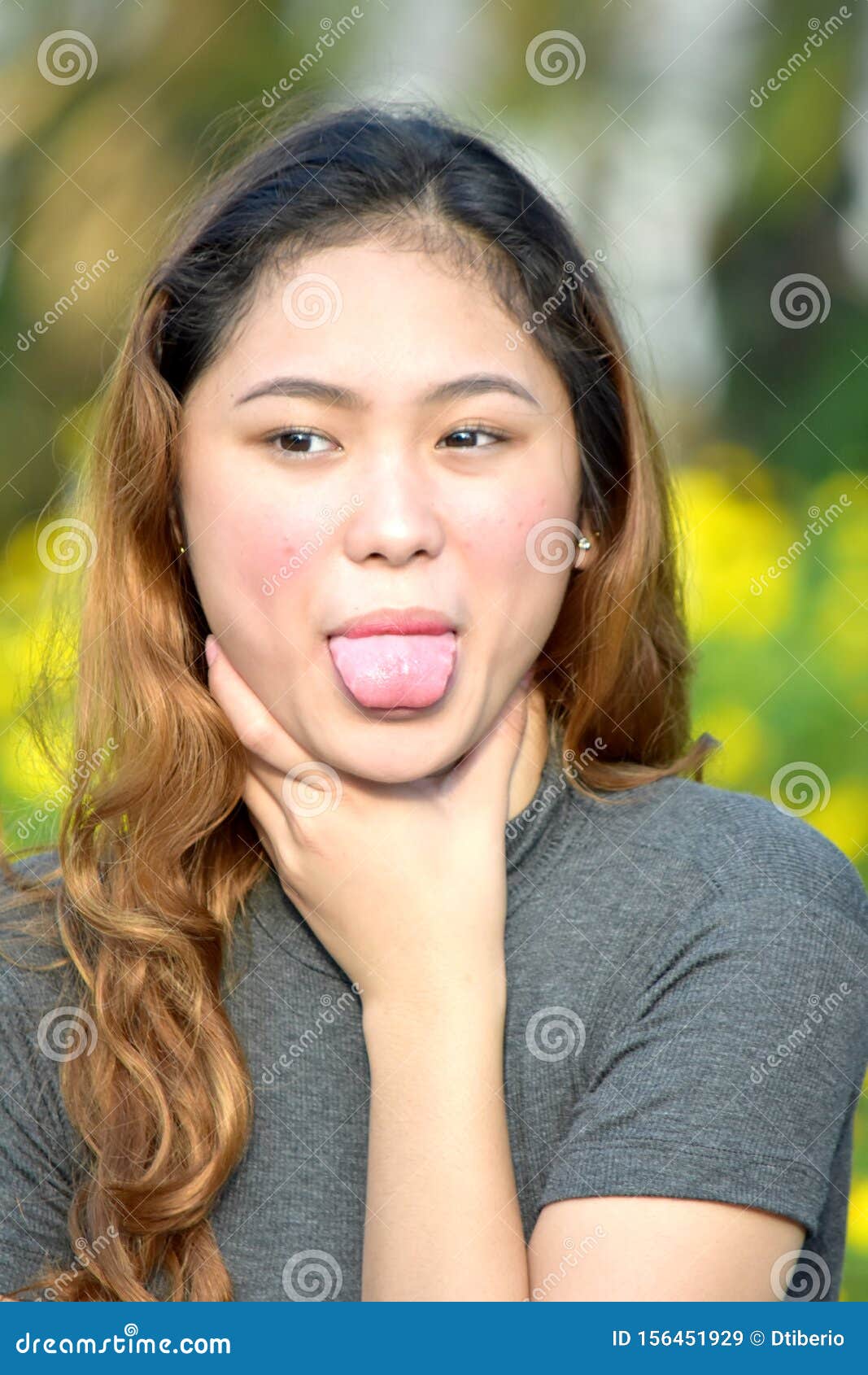 An Attractive Female Choking Stock Image - Image of cute, pretty: 156451929