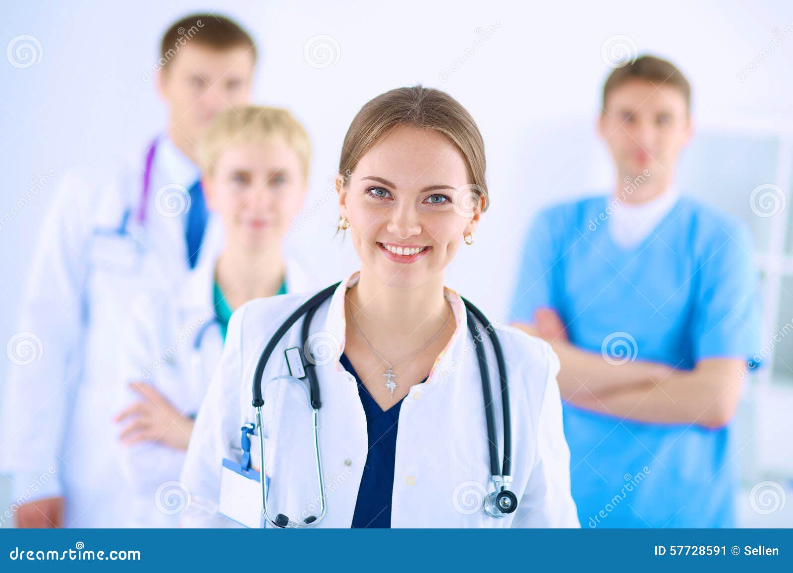 Attractive Female Doctor in Front of Medical Group Stock Image - Image ...