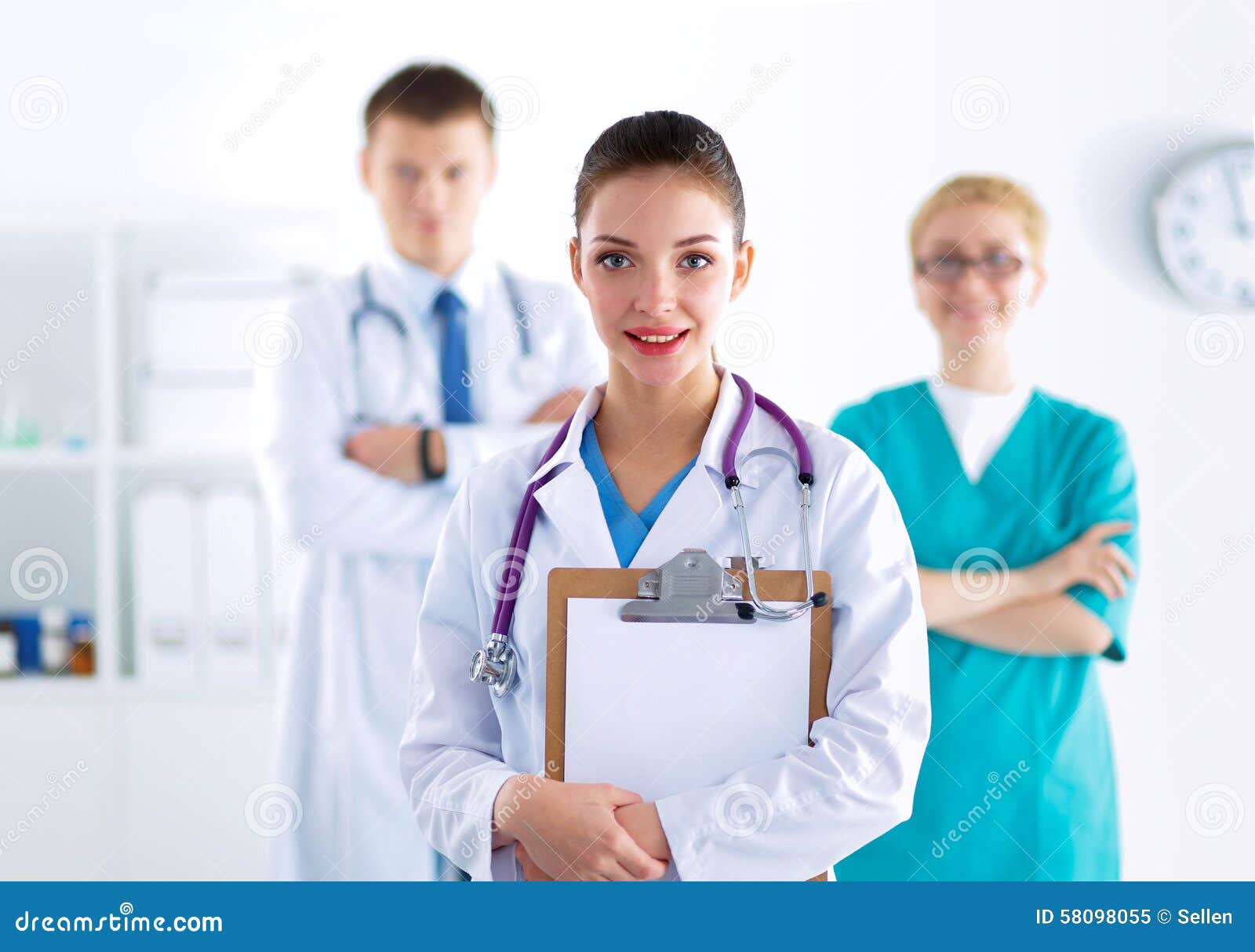 Attractive Female Doctor in Front of Medical Group Stock Image - Image ...