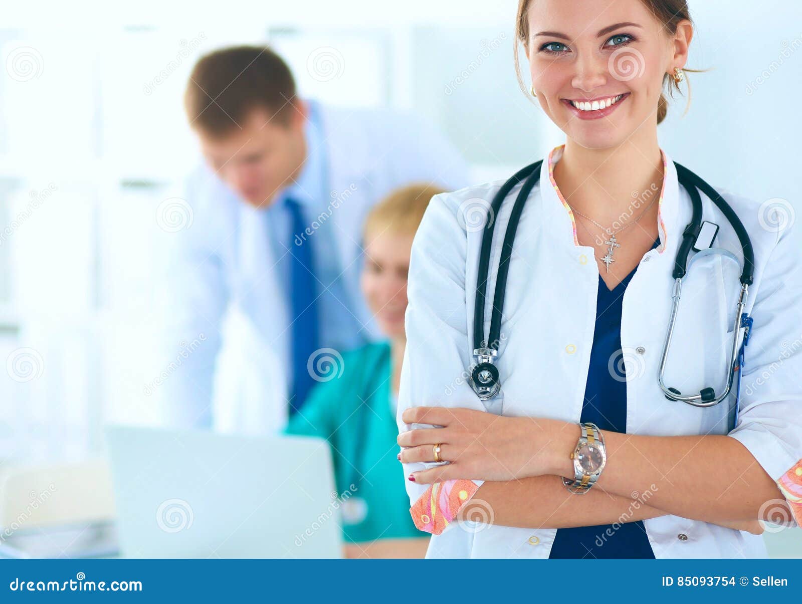 Attractive Female Doctor in Front of Medical Group Stock Photo - Image ...