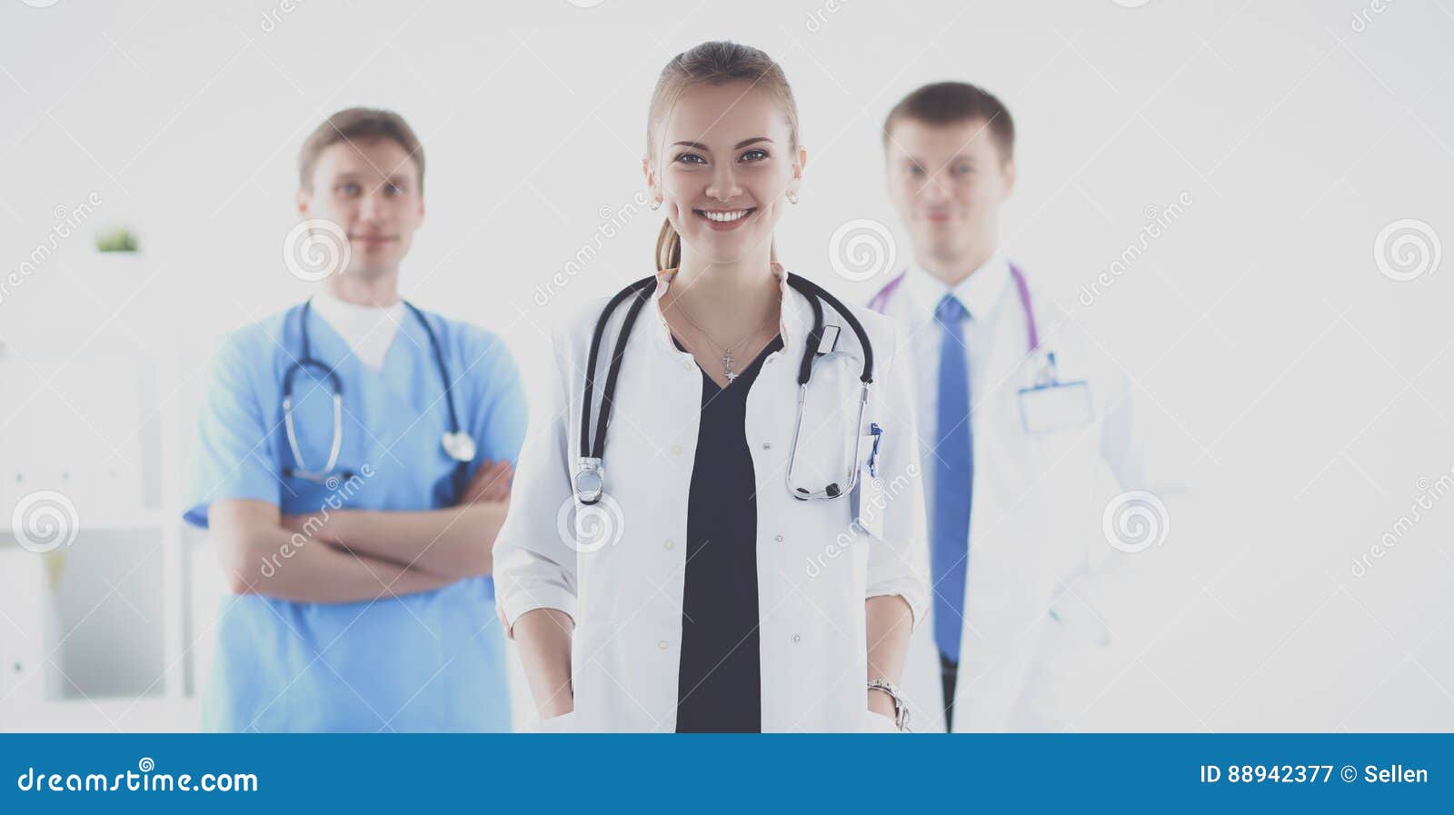 Attractive Female Doctor in Front of Medical Group Stock Image - Image ...
