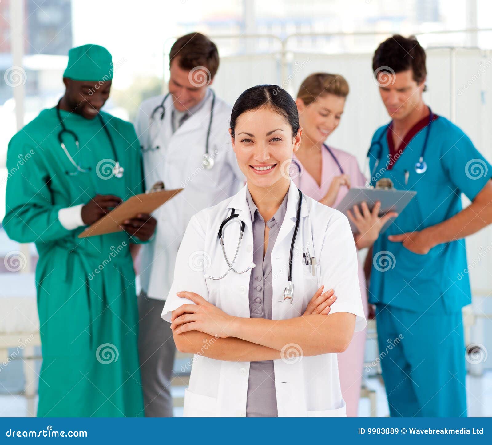 Attractive Female Doctor with Her Team Stock Image - Image of nurse ...