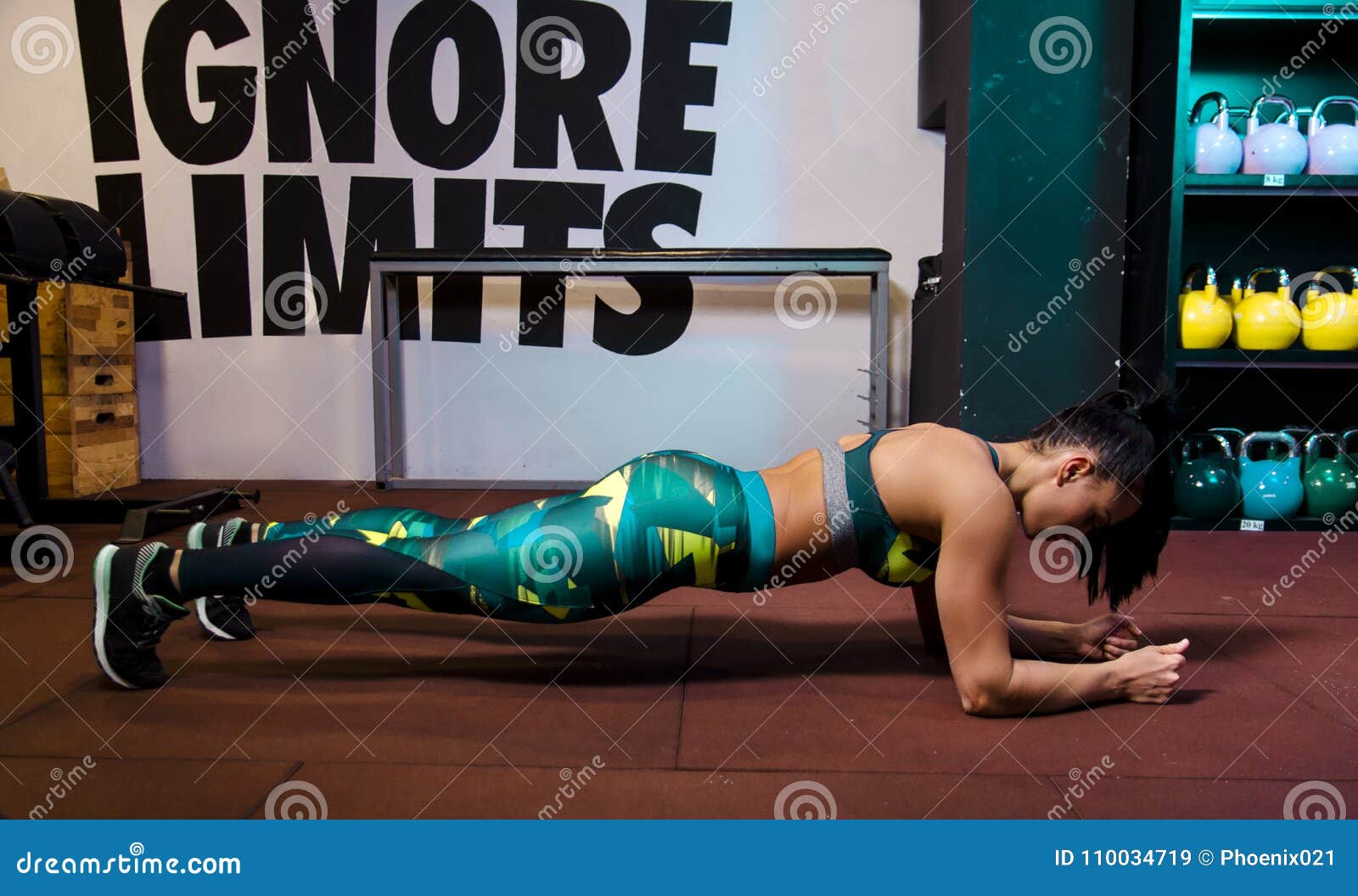 Attractive Female Doing Plank Exercise in Gym Stock Image - Image of ...