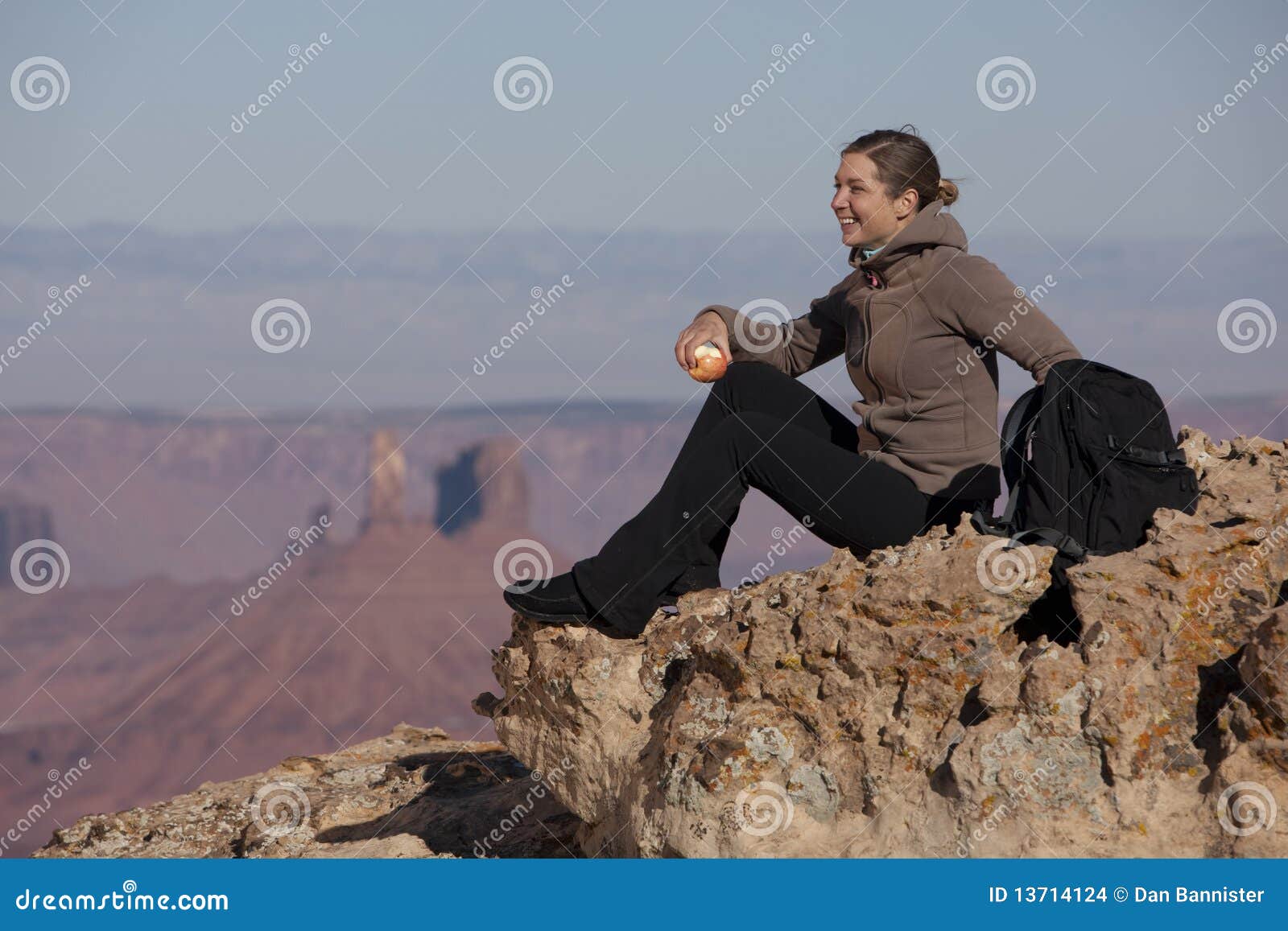 Attractive Female Hiker Sitting on a Rock Stock Photo - Image of ...