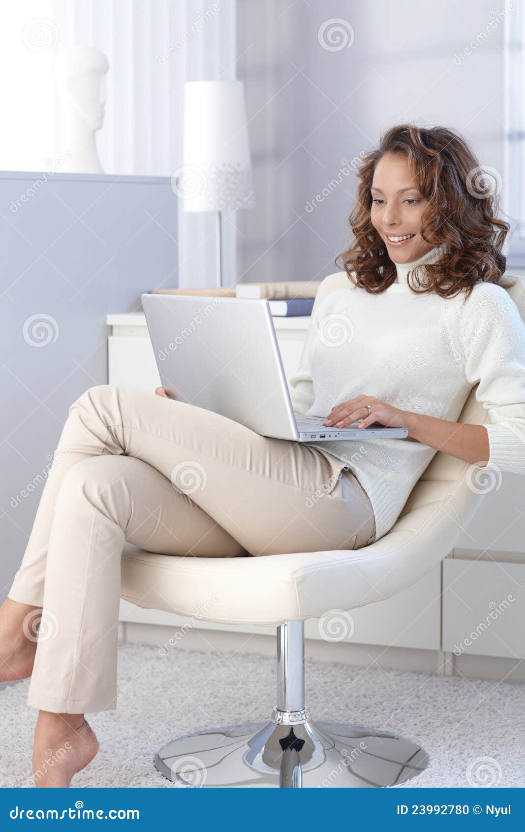 Attractive Female with Laptop at Home Stock Photo - Image of color ...