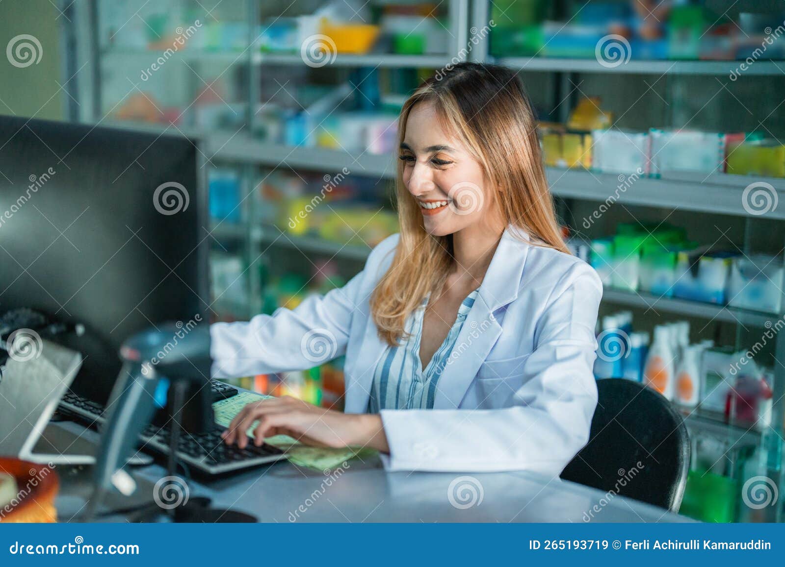 Attractive Female Pharmacist in Uniform Working on Pc Computer Stock ...