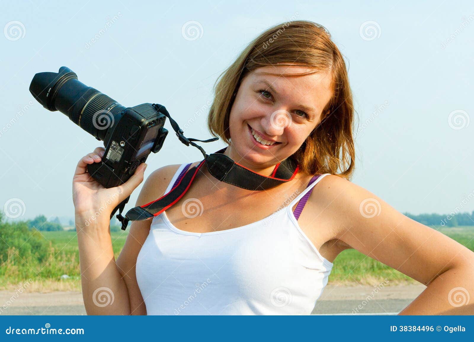 Attractive Female Photographer with Camera Stock Photo - Image of ...