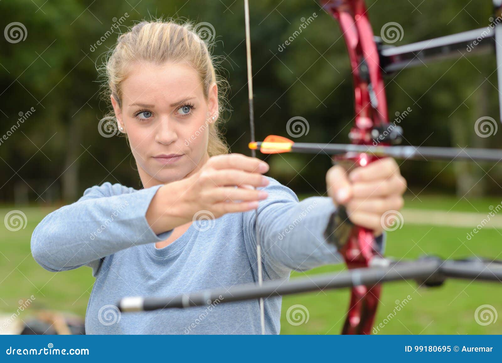 Attractive Female Practicing Archery at Range Stock Image - Image of ...