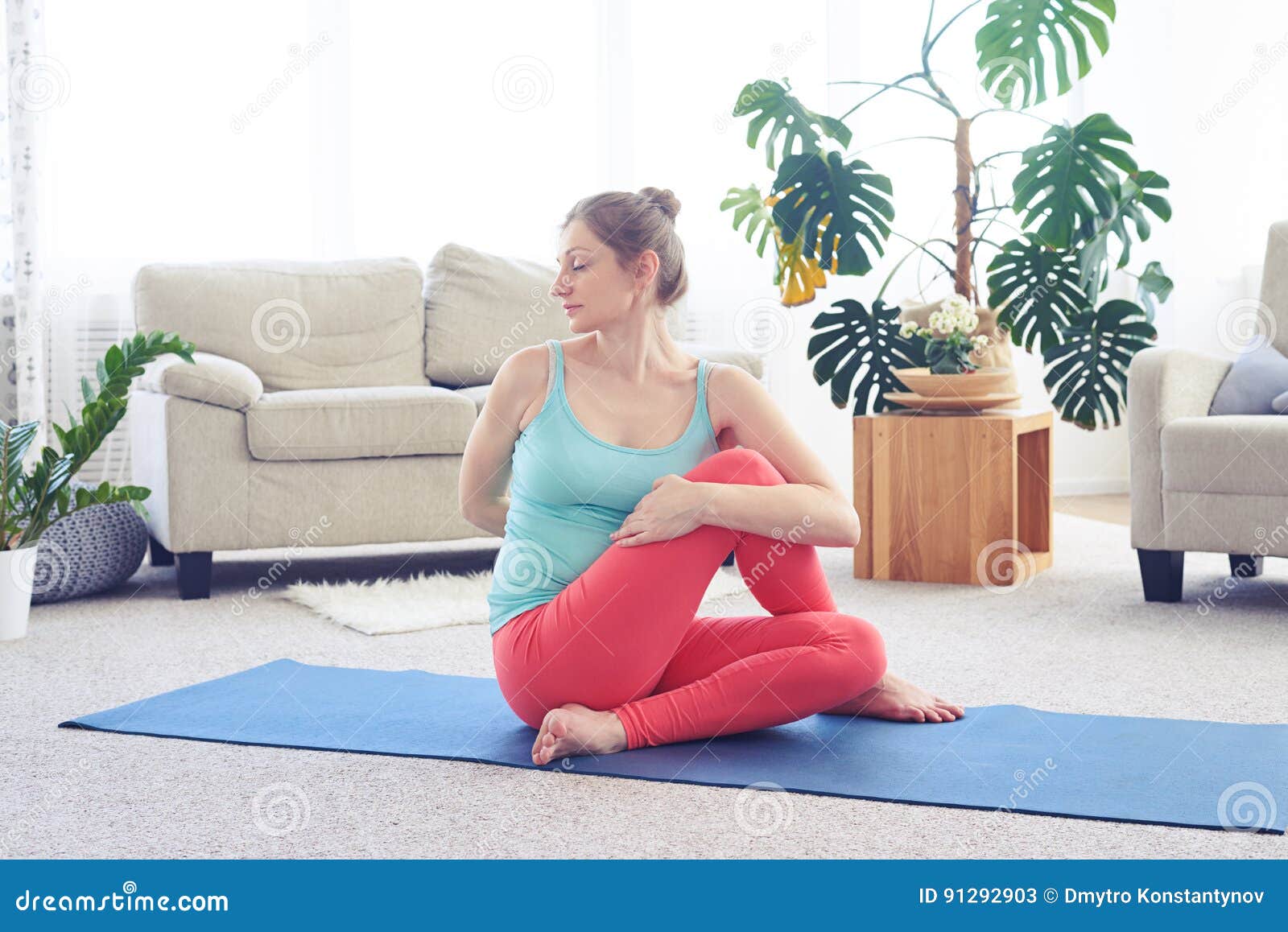 Attractive Female Practicing Seated Twist Pose Stock Image - Image of ...