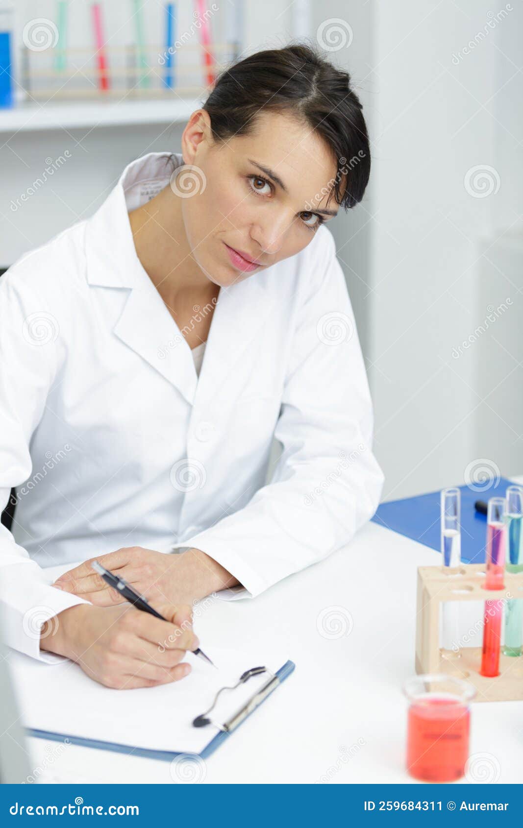 Attractive Female Scientist Writing Notes in Lab Stock Image - Image of ...