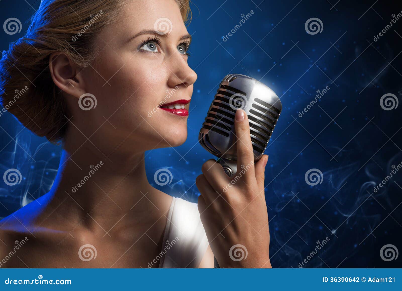Attractive Female Singer with Microphone Stock Photo - Image of curly ...