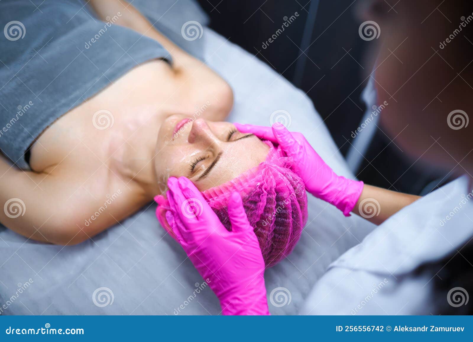 Attractive Female At Spa Health Club Getting A Facial Massage