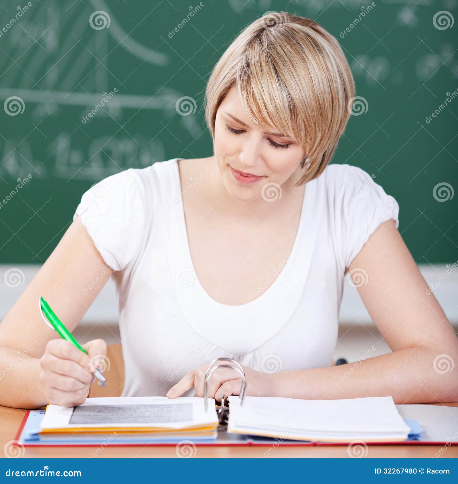 Attractive Female Student Working in Class Stock Photo - Image of ...