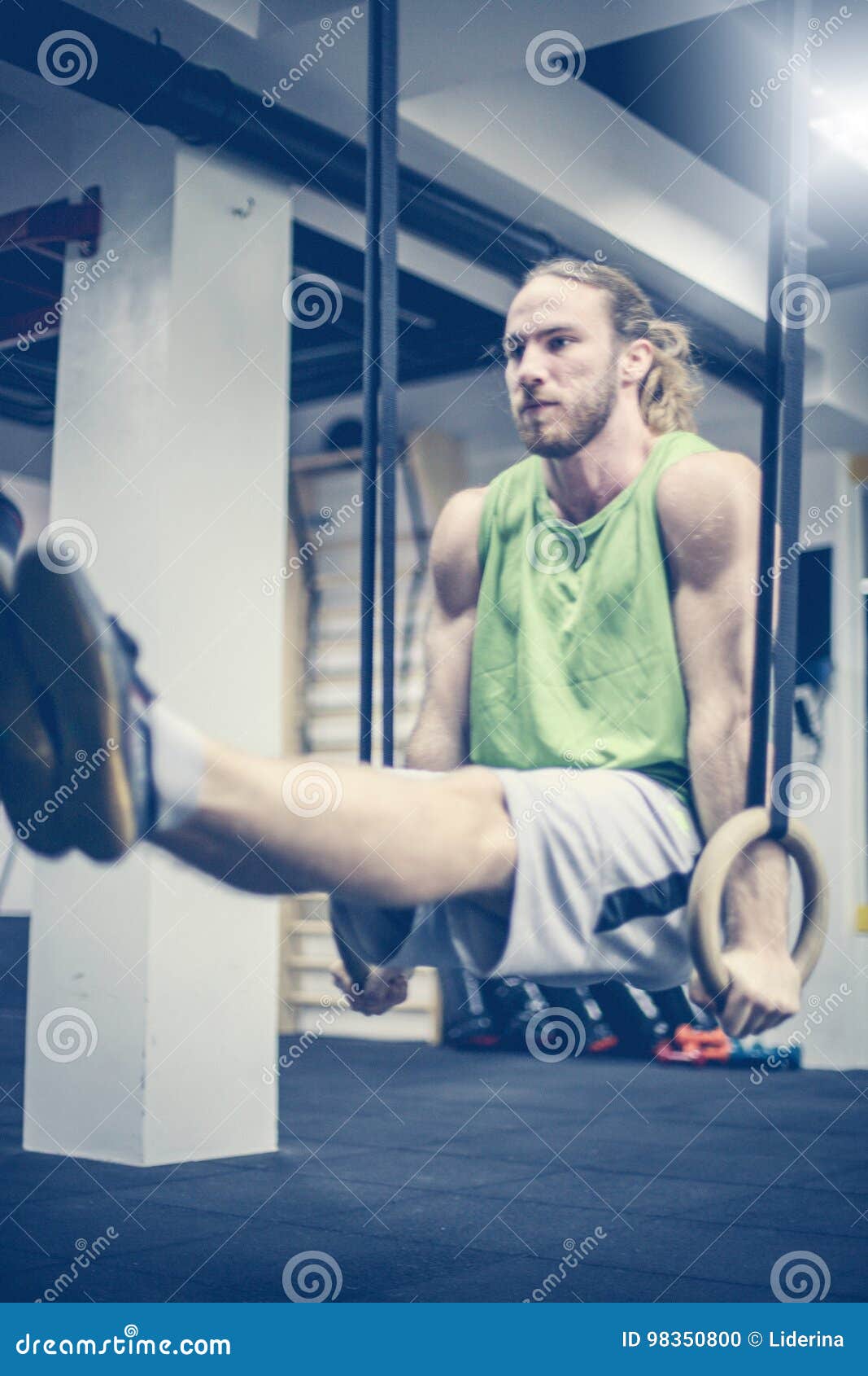 Attractive Fit Man Working Out at the Gym. Stock Photo - Image of ...