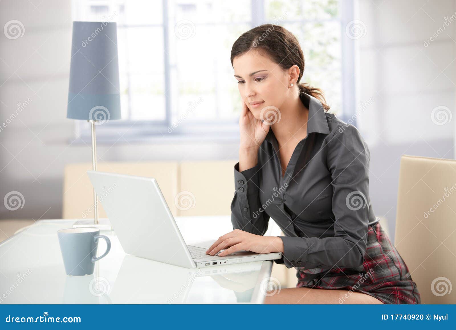 Attractive Girl Browsing Internet at Home Stock Photo - Image of ...
