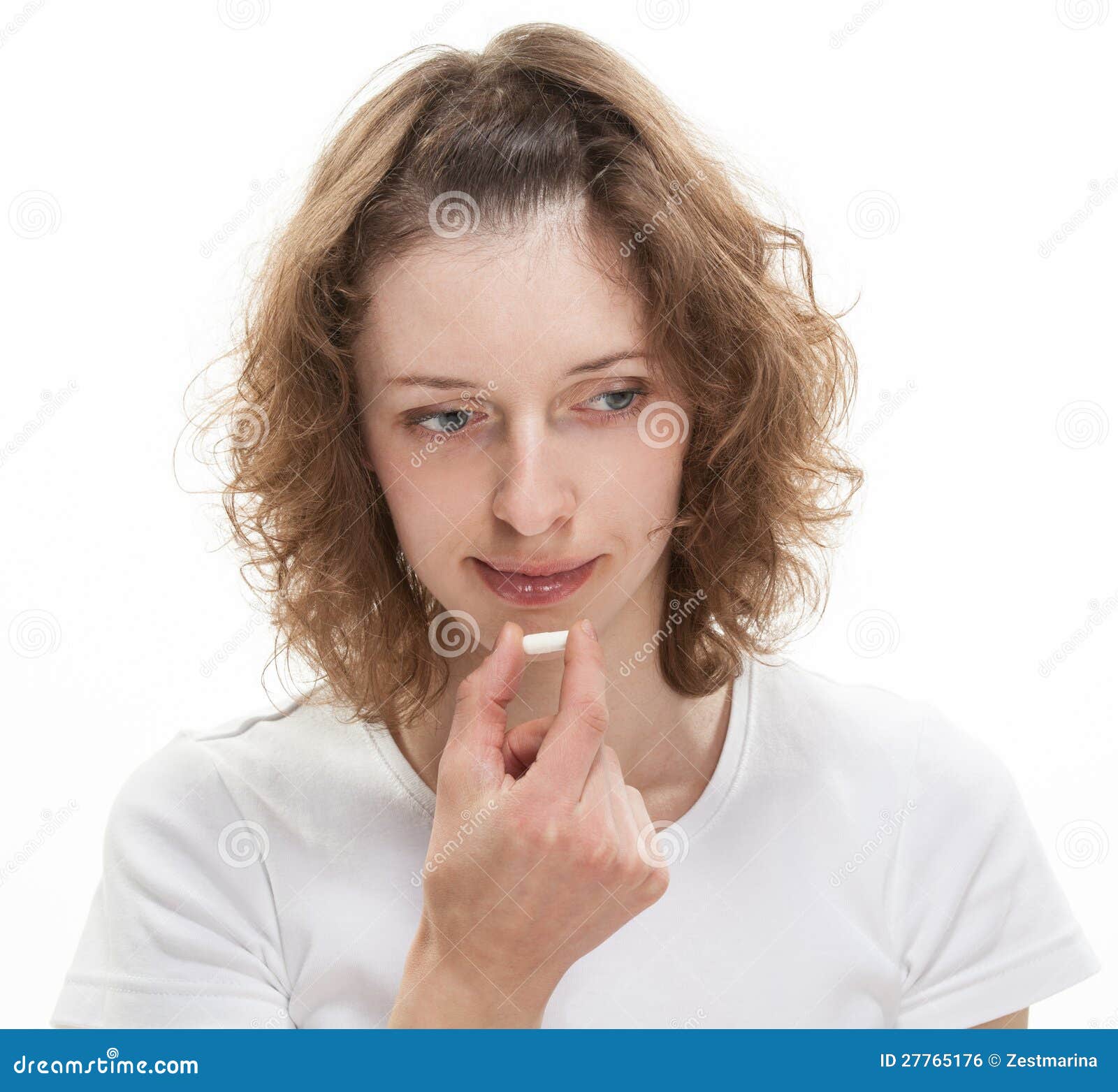 Attractive Girl Eating Tablet Stock Photo - Image of pills, girl: 27765176