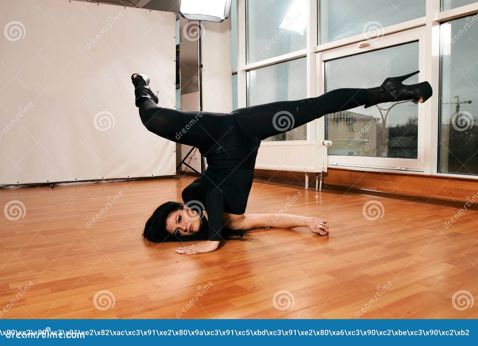 Attractive Girl With A Good Figure Dancing Strip Plastic In The Dance